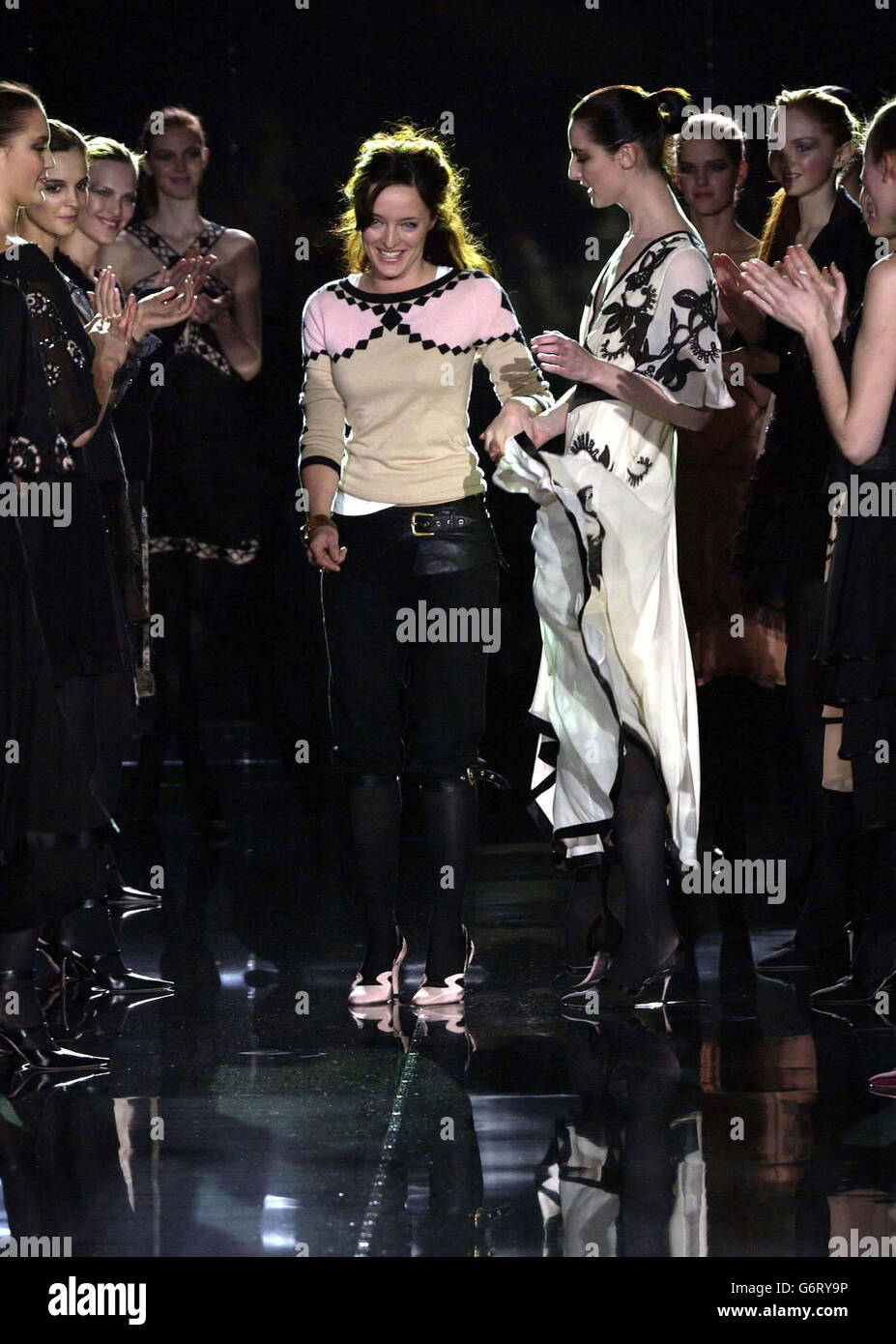 Fashion designer Alice Temperley, surrounded by models on the catwalk ...