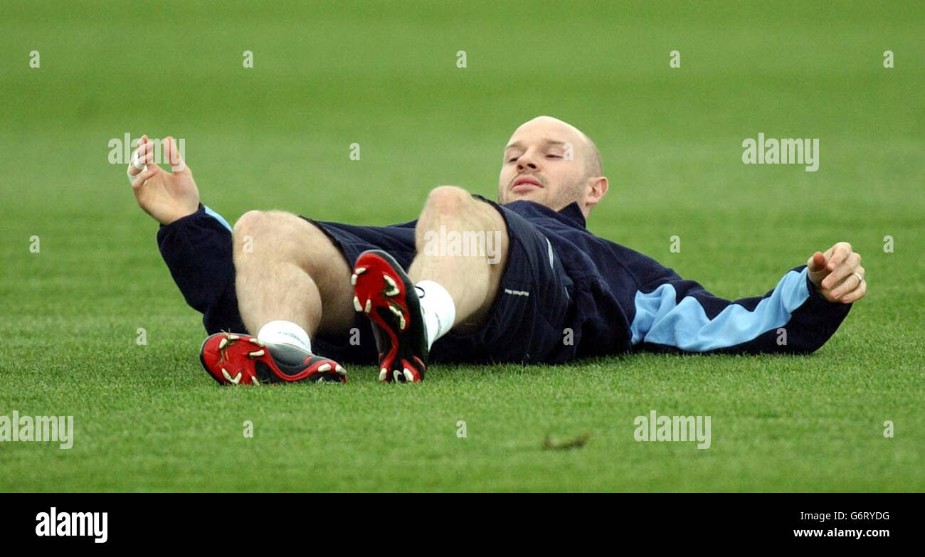 Football on ground lying down danny mills hi-res stock photography and ...