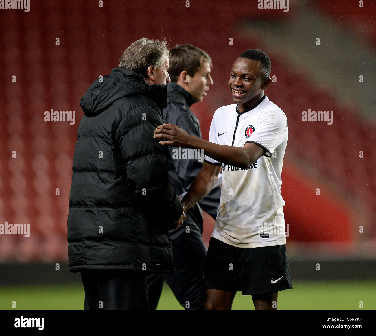 Charlton Athletic's Regan Cook (right) celebrates with head of coaching ...