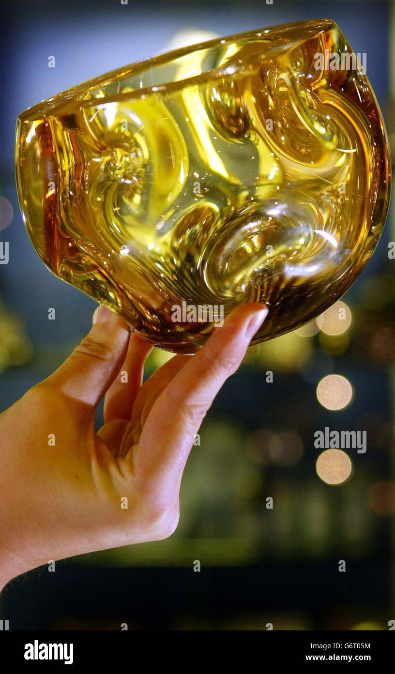 Kelly Greig of Stockwell Bazaar in Glasgow, holds a vase made by world ...