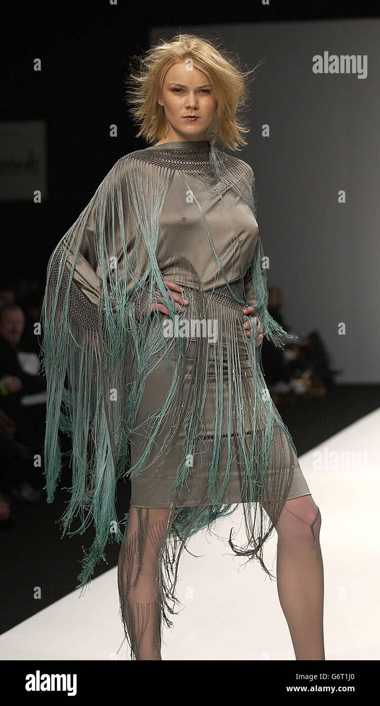 A model on the catwalk wearing designs by Francis Howie, as part of the ...