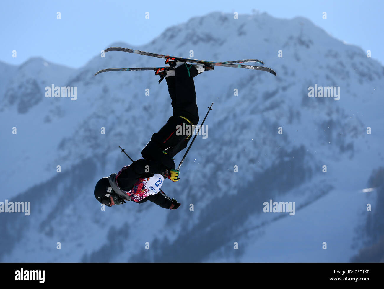 A competitor does a jump during ski slopestyle training at the Rosa ...