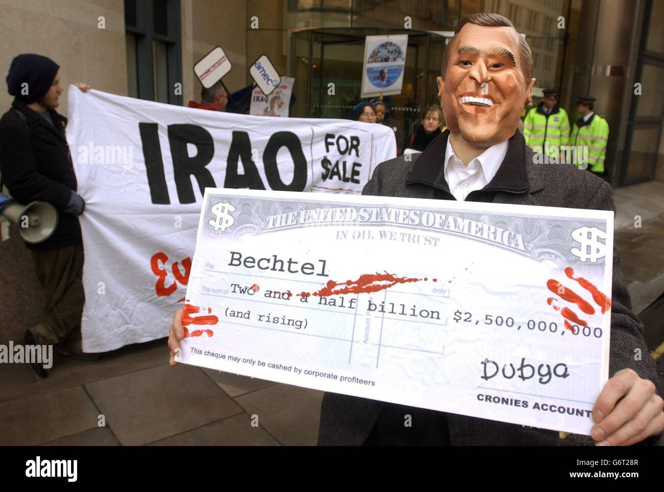 Protest over corporate invasion of Iraq Stock Photo - Alamy