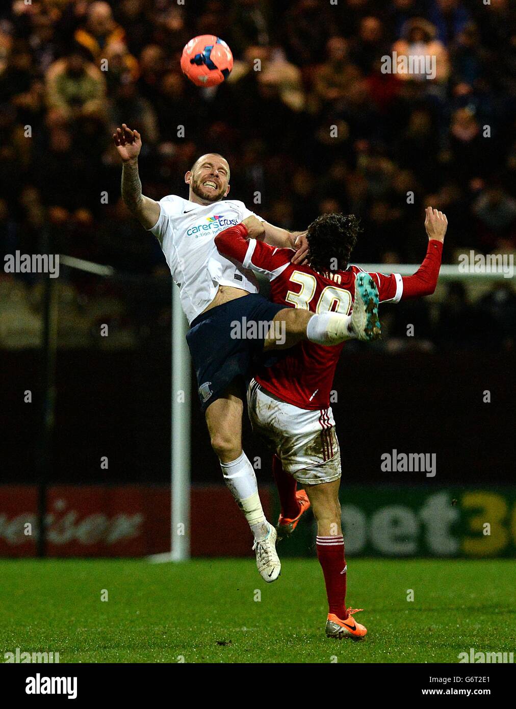 Preston North End's Keith Keane (left) and Nottingham Forest's Djamel ...