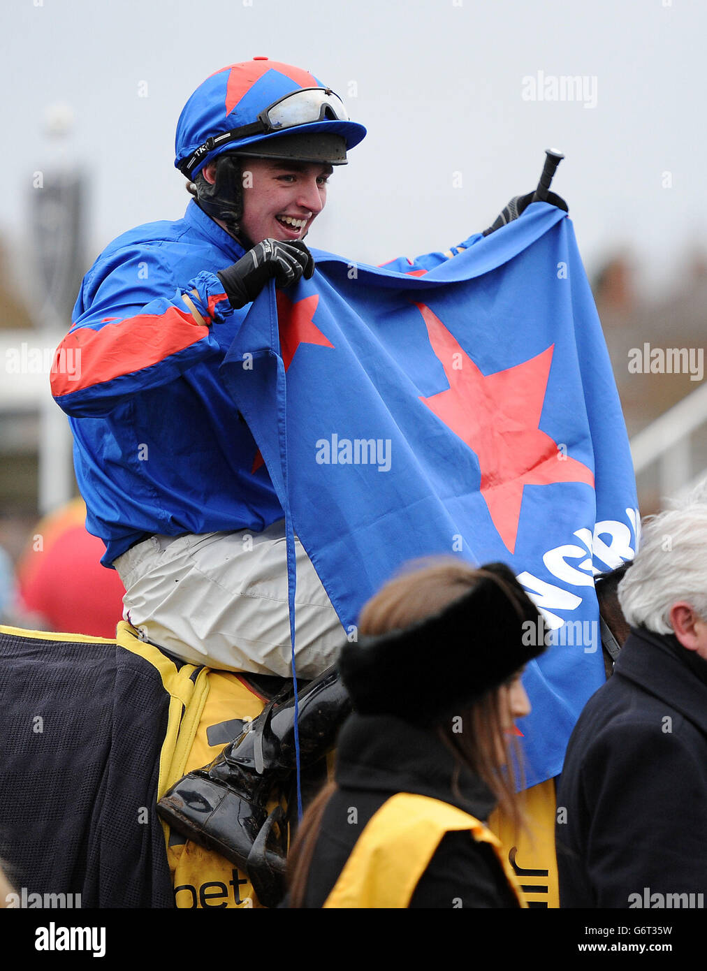Jockey Ryan Hatch celebrates after winning the Betfair Hurdle on Spalsh ...