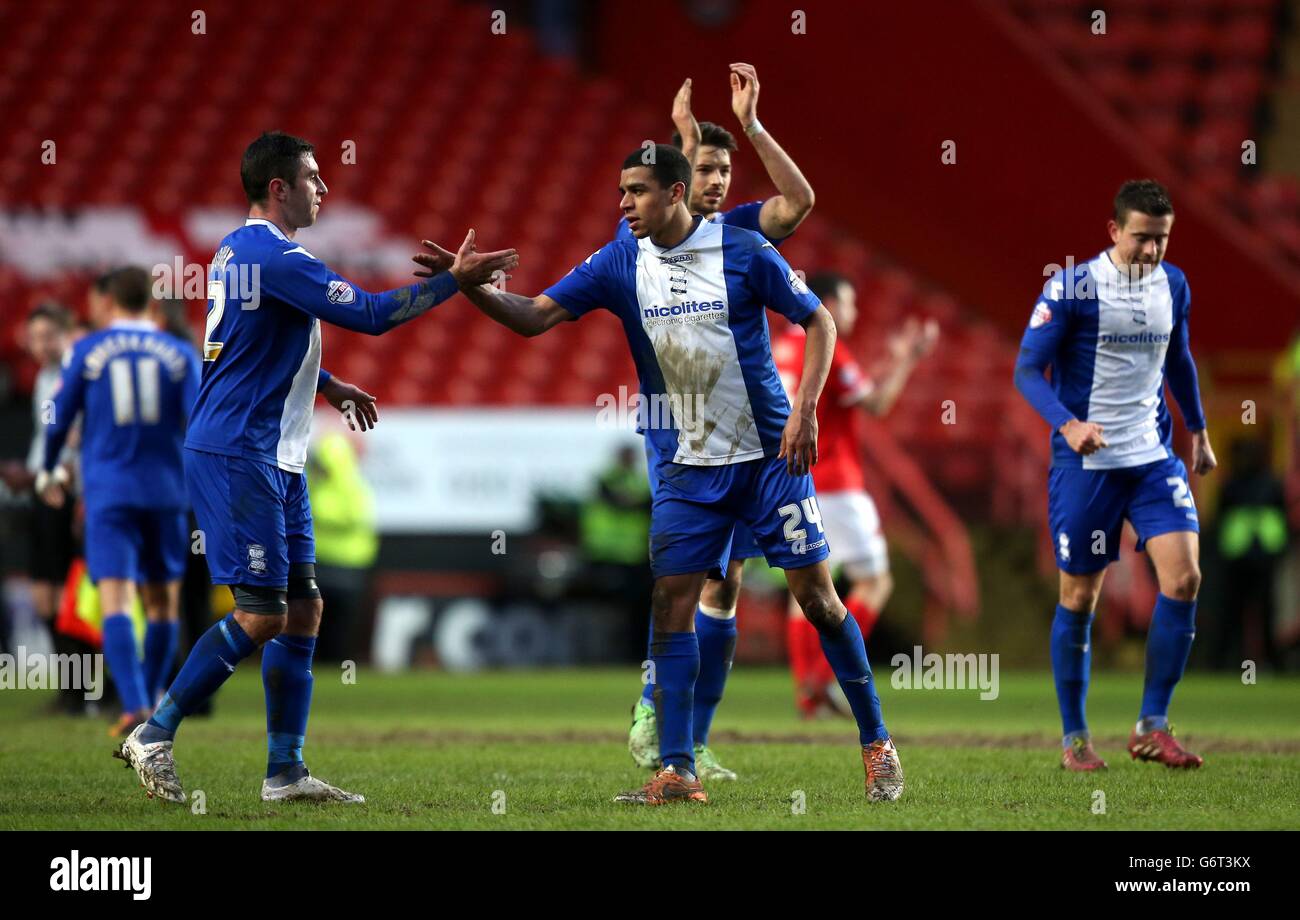 Birmingham City's Lee Novak (left) and Tom Adeyemi (centre) celebrate ...