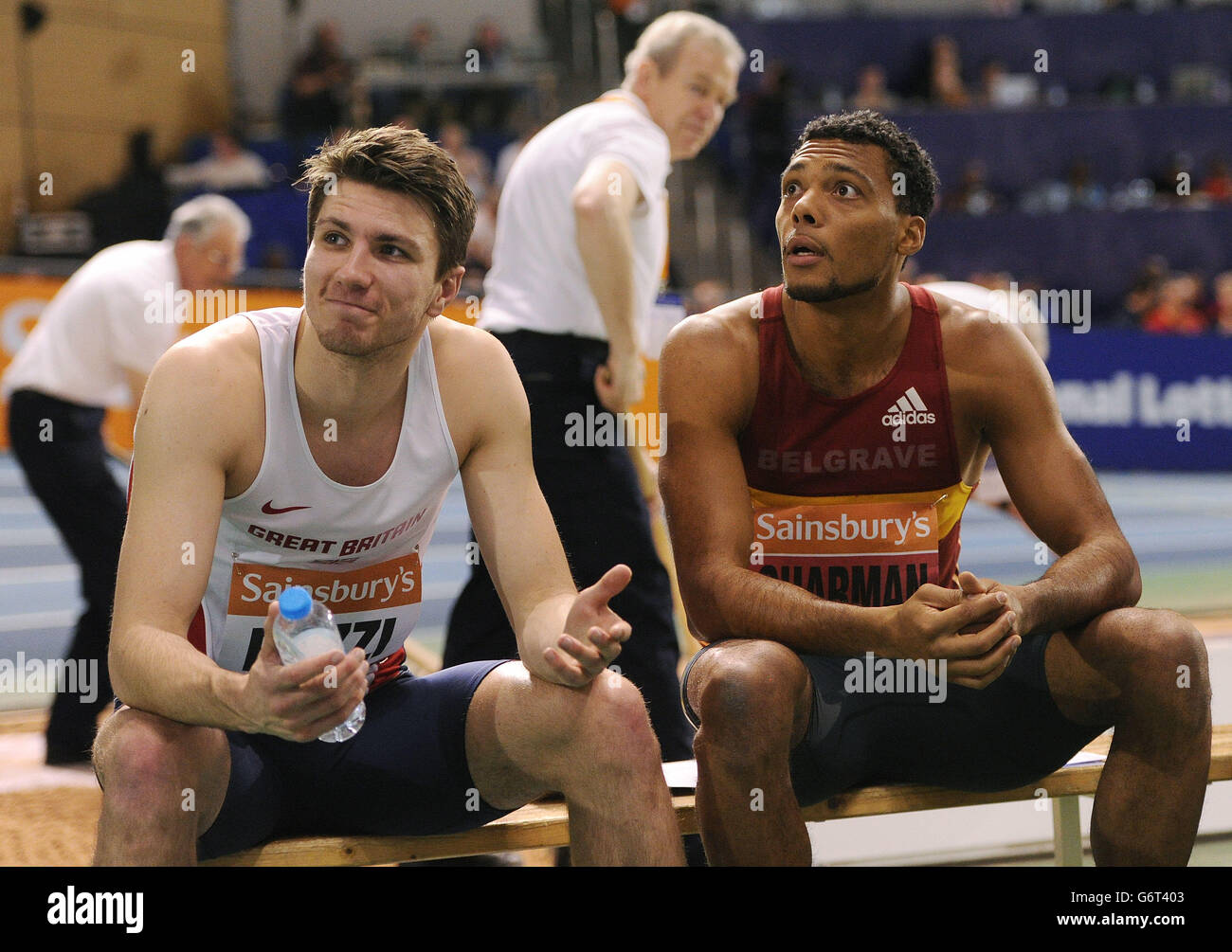 Andrew Pozzi (left) and William Sharman look at the scoreboard after a ...