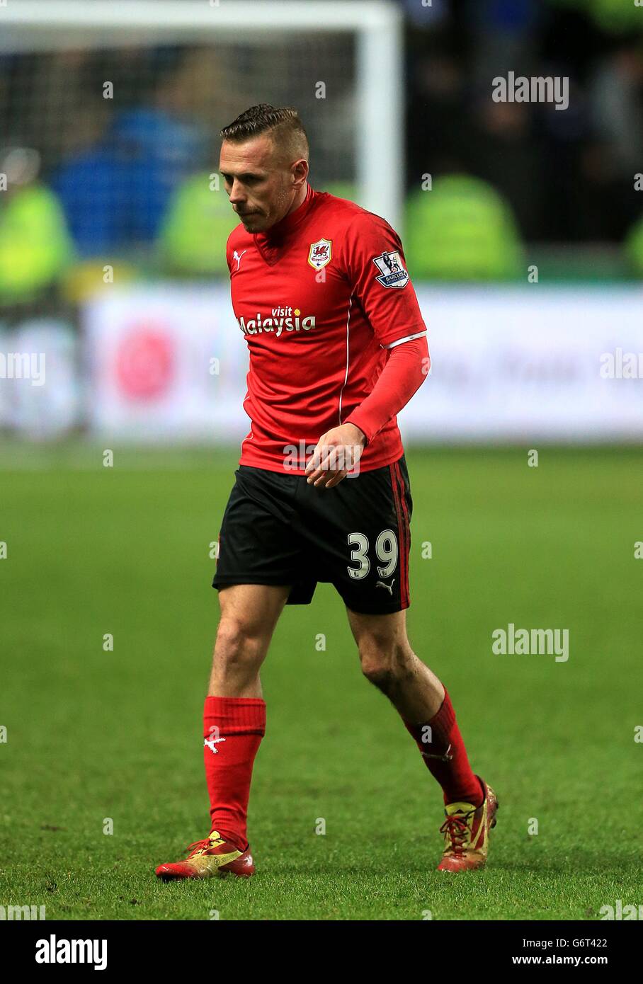 Cardiff citys craig bellamy appears dejected after the final whistle hi ...