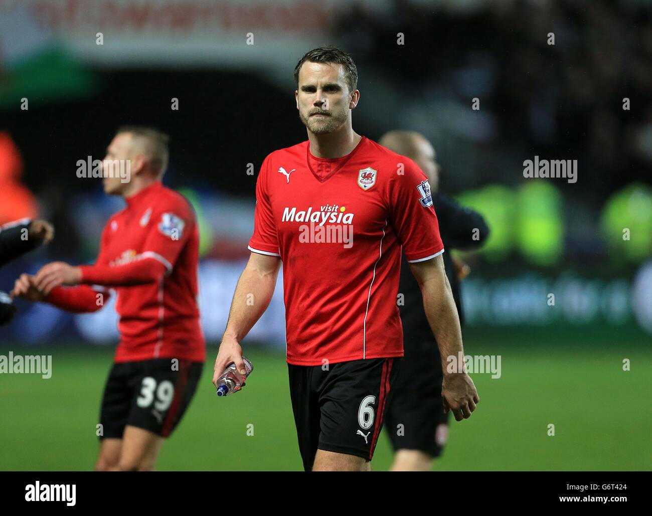Cardiff City's Ben Turner appears dejected after the final whistle ...