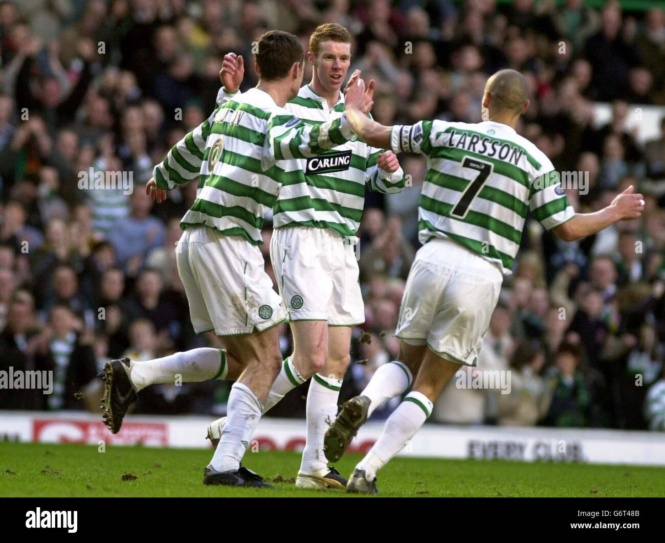 Stephen Pearson (centre) celebrats scoring the fiirst goal for Celtic ...