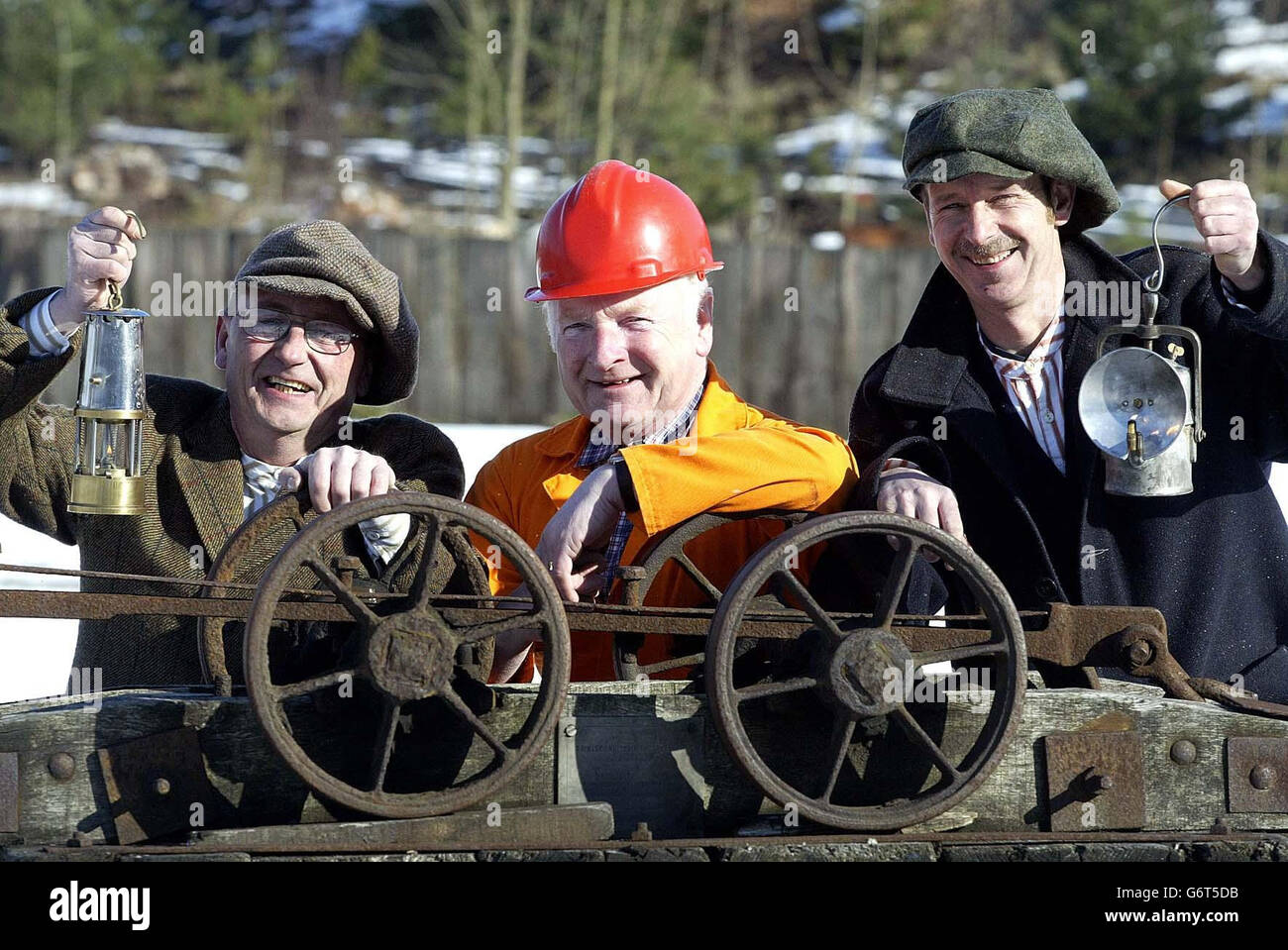 Retiring miner Martin Gallagher (centre) with ex-pitmen Stuart Davison ...
