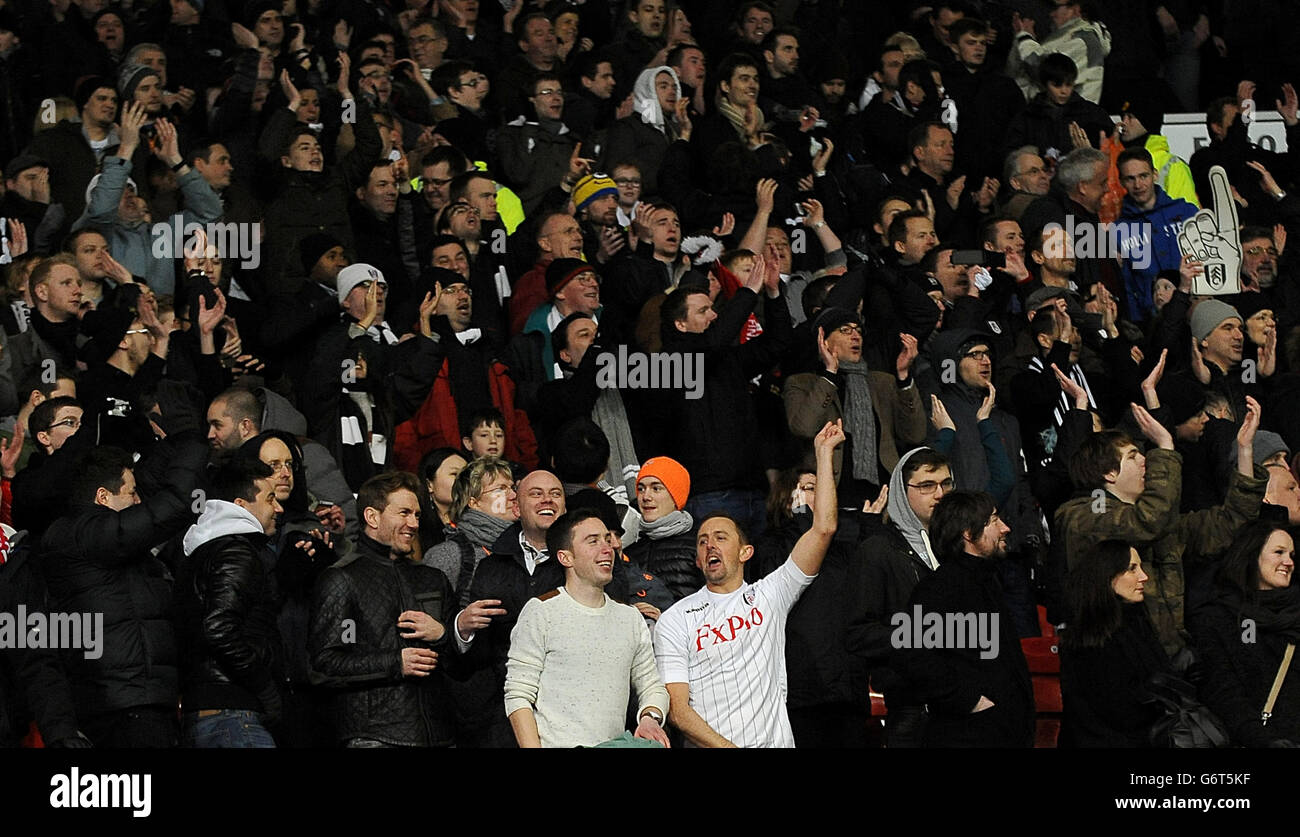 Manchester united fans celebrate in the stands hi-res stock photography ...