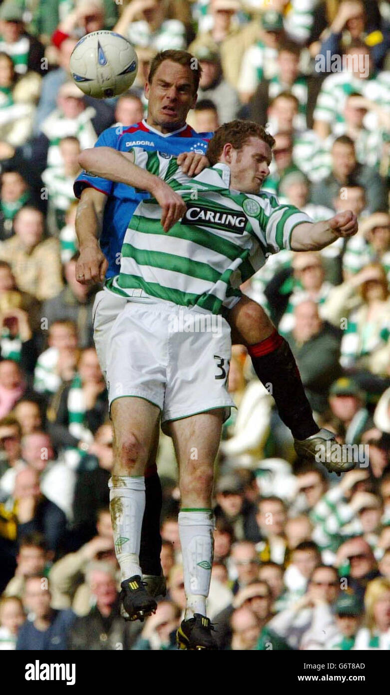 Rangers Frank De Boer (left) with Celtic's Craig Beattie during the ...