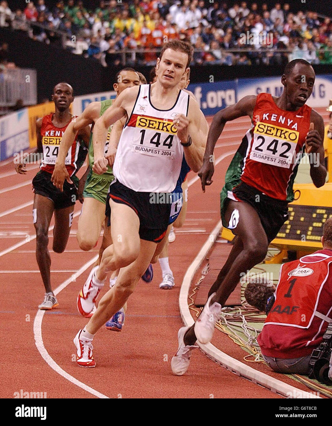 Michael East of Great Britain (no 144) tails eventual winner Paul Korir ...