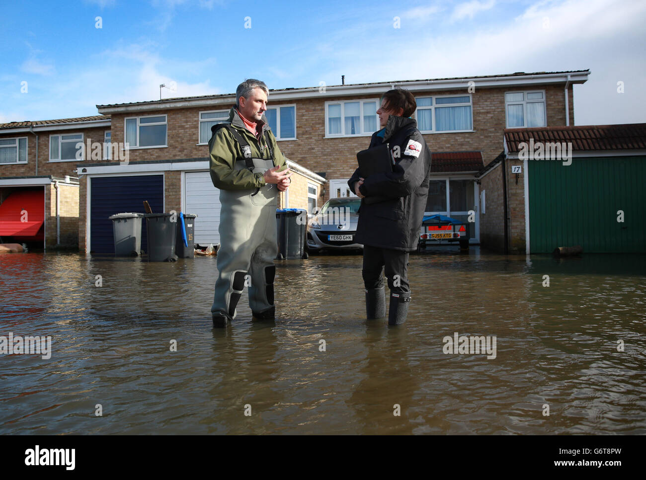Direct Line Claims expert Lorna Tincknell (right) talks to flood victim ...