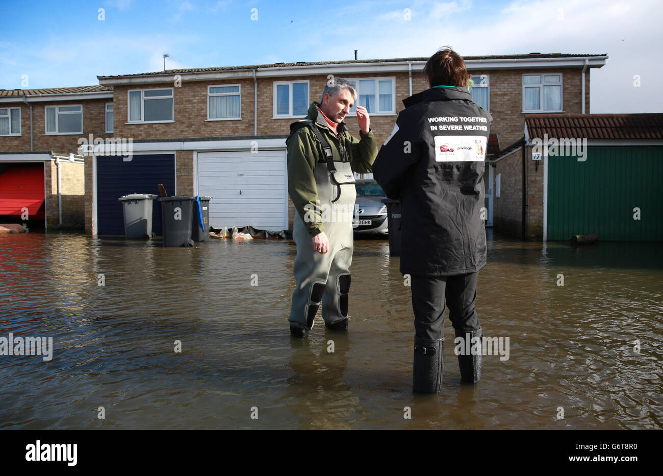 Direct Line Claims expert Lorna Tincknell (right) talks to flood victim ...