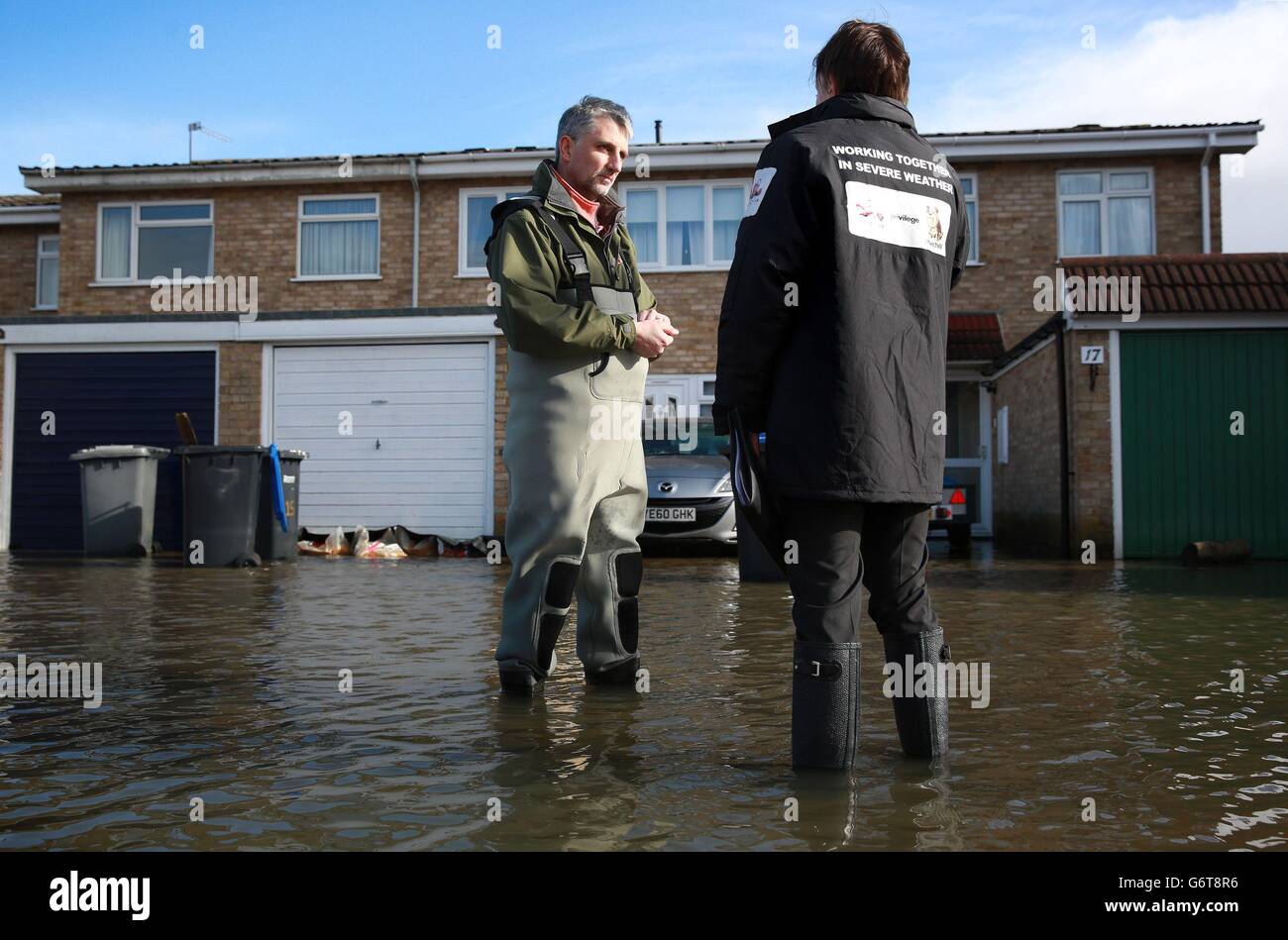 Direct Line Claims expert Lorna Tincknell (right) talks to flood victim ...