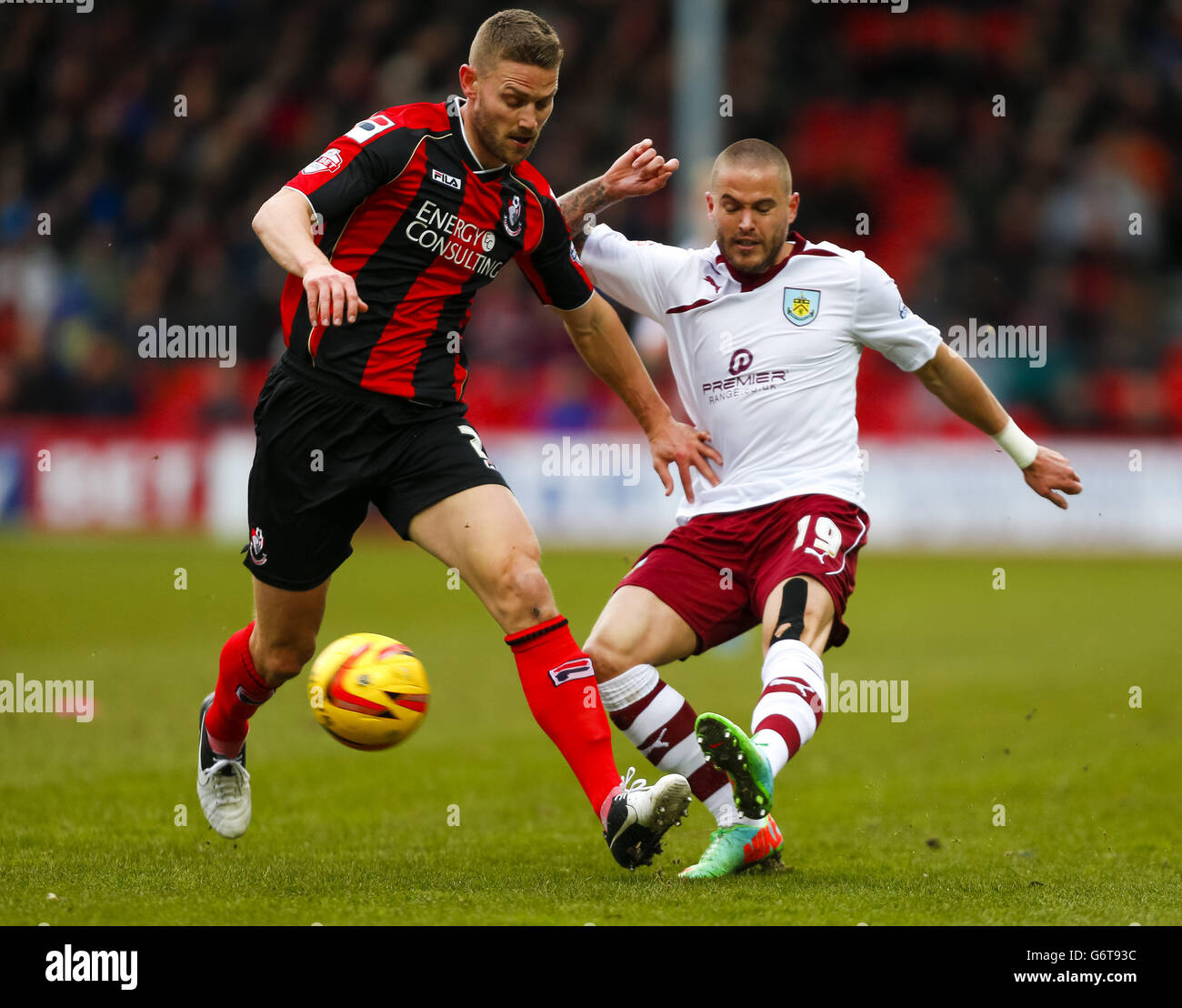 Burnley's Michael Kightly (right) and AFC Bournemouth's Simon Francis ...