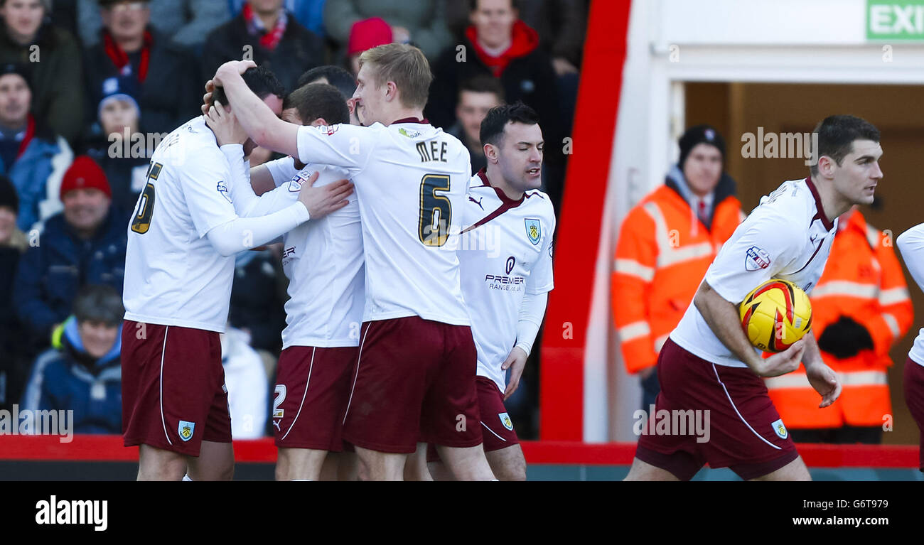 Burnley's Keith Treacy (left) celebrates scoring against AFC ...