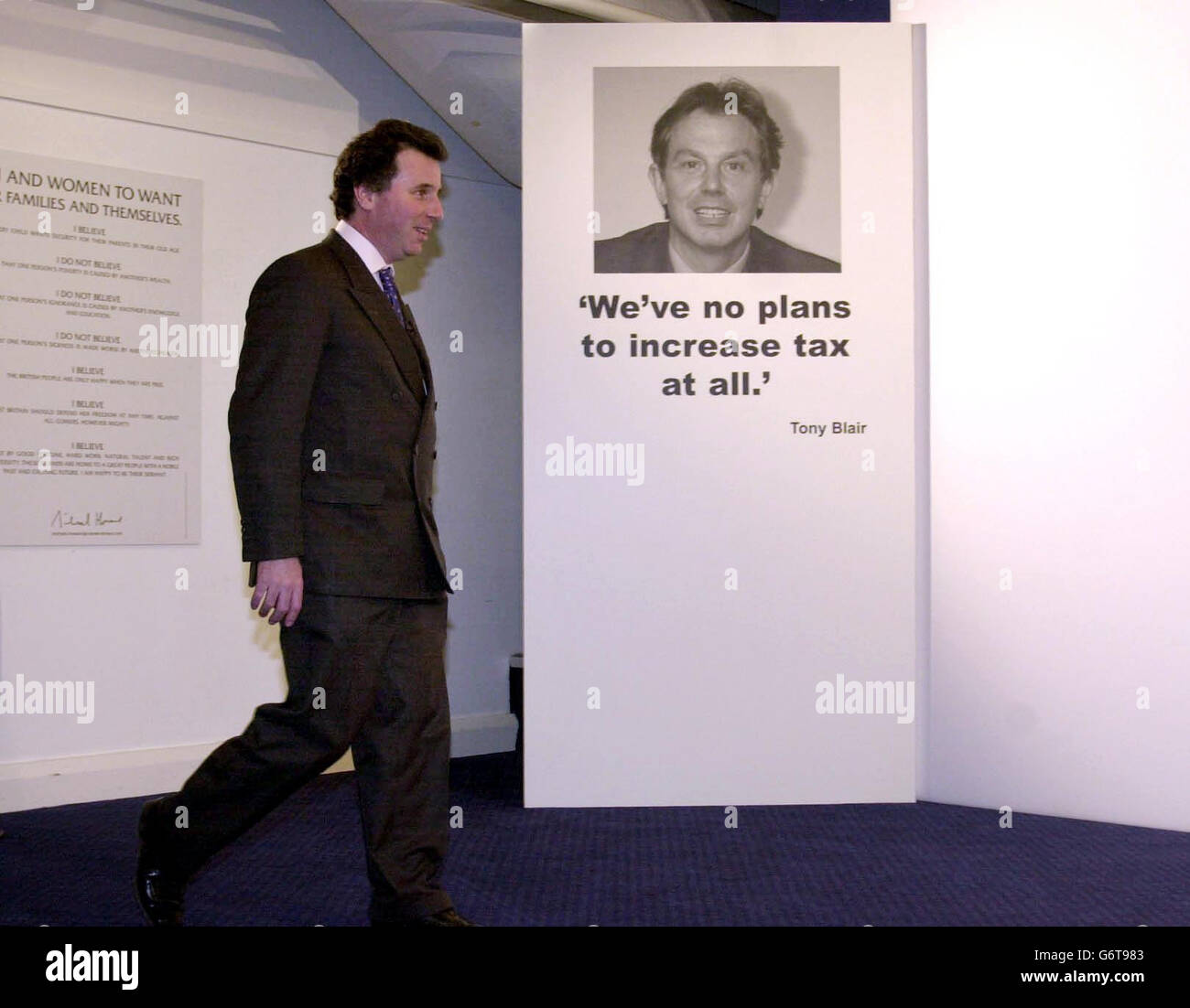 Standing against a wall of banknotes hi-res stock photography and ...
