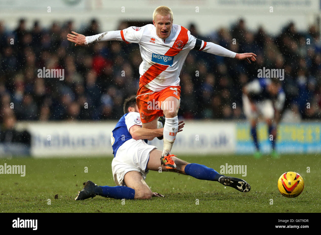 Ipswich Town's Cole Skuse and Blackpool's David Perkins compete for the ...
