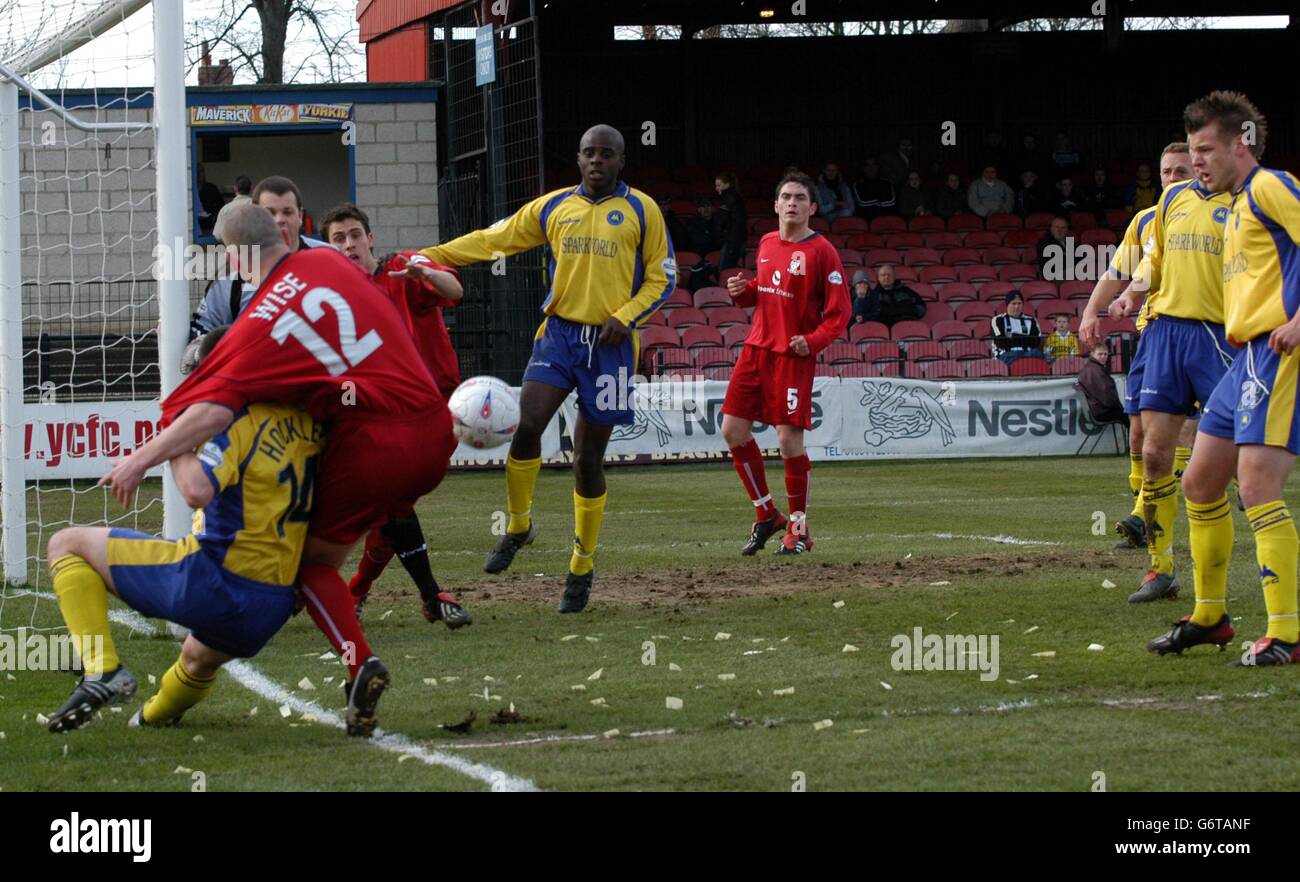 Stuart Wise York City (12) battles with Matthew Hockley (14) of Torquay ...