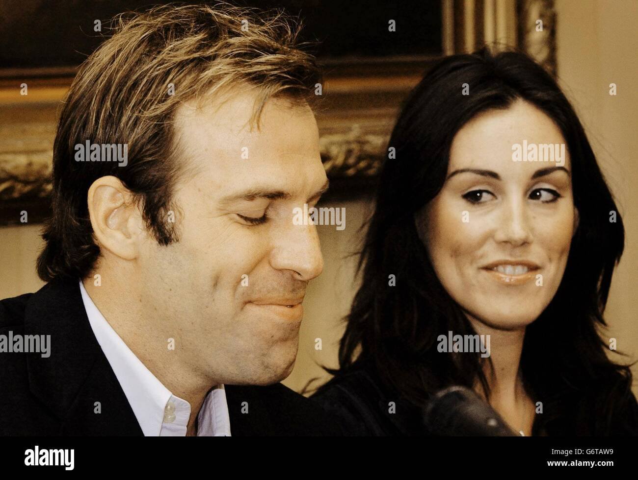 Tennis player Greg Rusedski and his wife Lucy attend a press conference ...