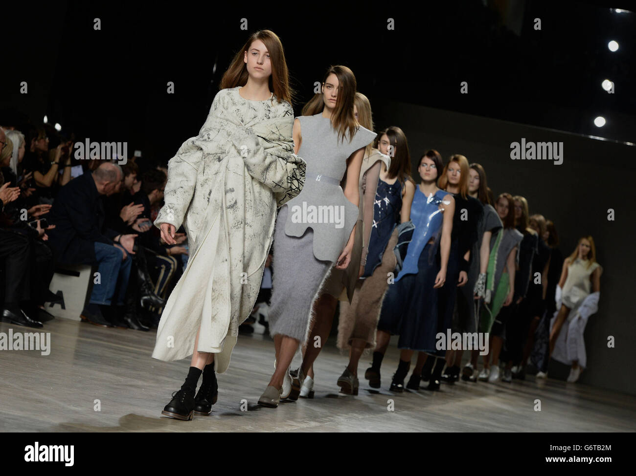Models appear on the catwalk during the Helen Lawrence Fashion East ...
