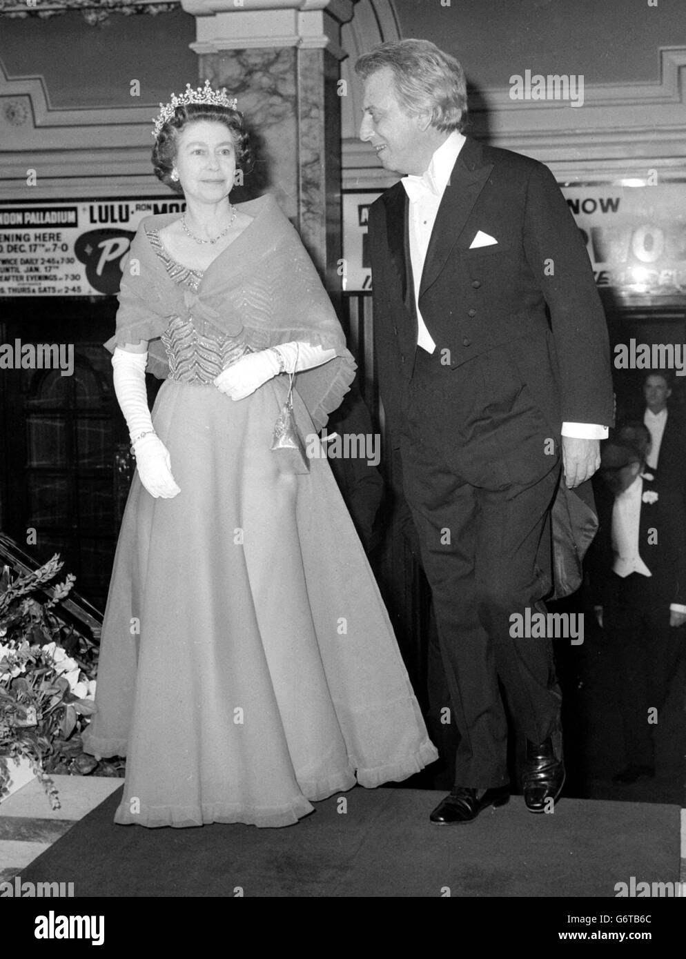The Queen with impresario Bernard Delfont as she arrives for the Royal ...