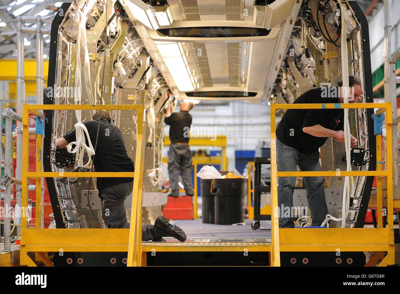 Workers at the Bombardier plant in Derby after the train manufacturer ...
