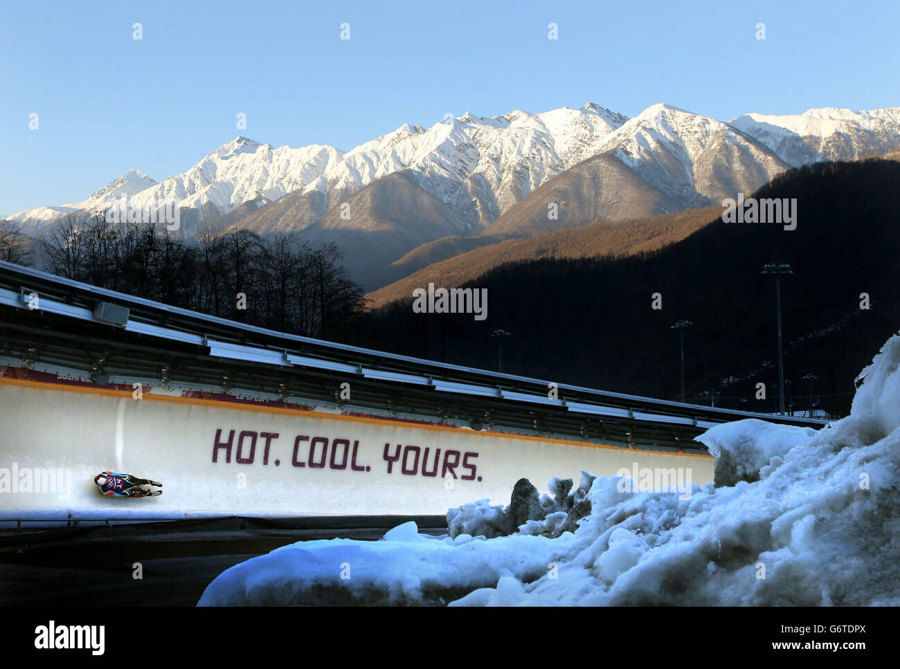 Romania Valentin Cretu goes round a bend during luge training at the ...