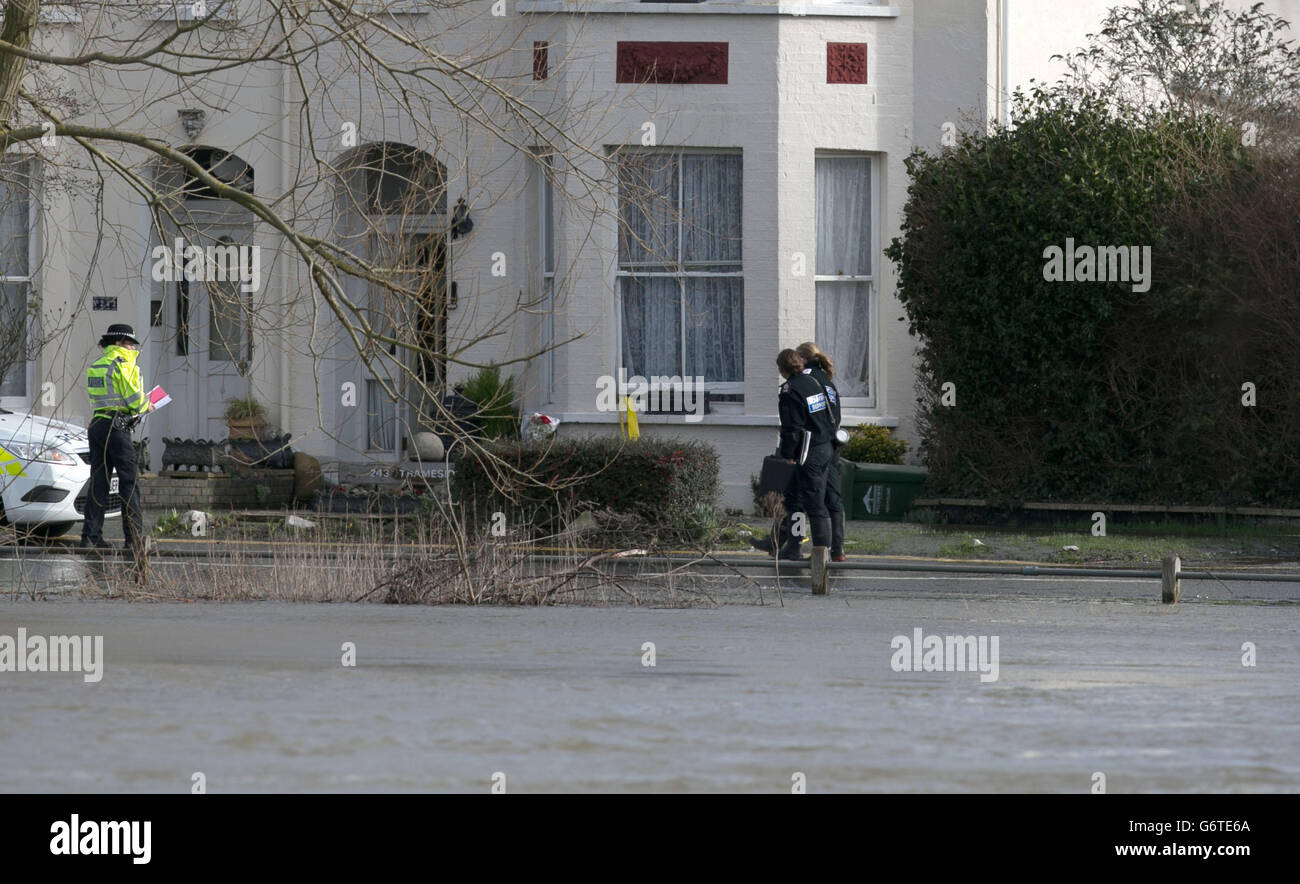 Scene of crime officers at a house in Thameside in Chertsey, Surrey ...