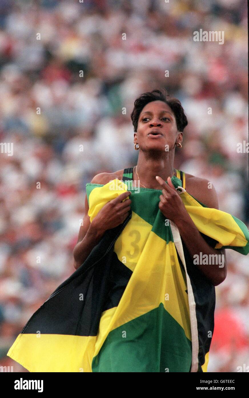 Jamaicas dione rose celebrates gold in 100m hurdles hi-res stock ...