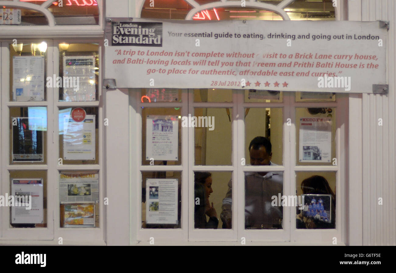 Brick Lane restaurants - London - stock. Preem restaurant on Brick Lane ...