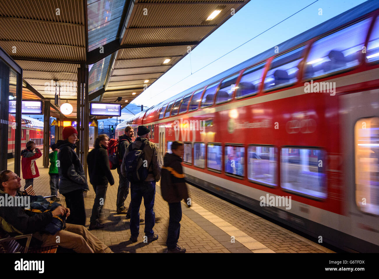 double-deck train and passengers of the S-Bahn Dresden DB AG in Pirna ...