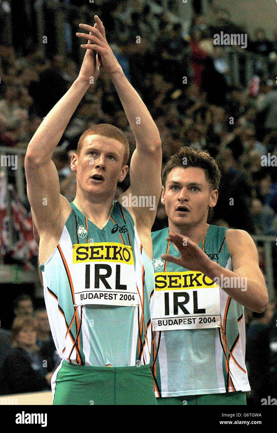 David McCarthy of Ireland (left) acknowledges the crowd after running a ...