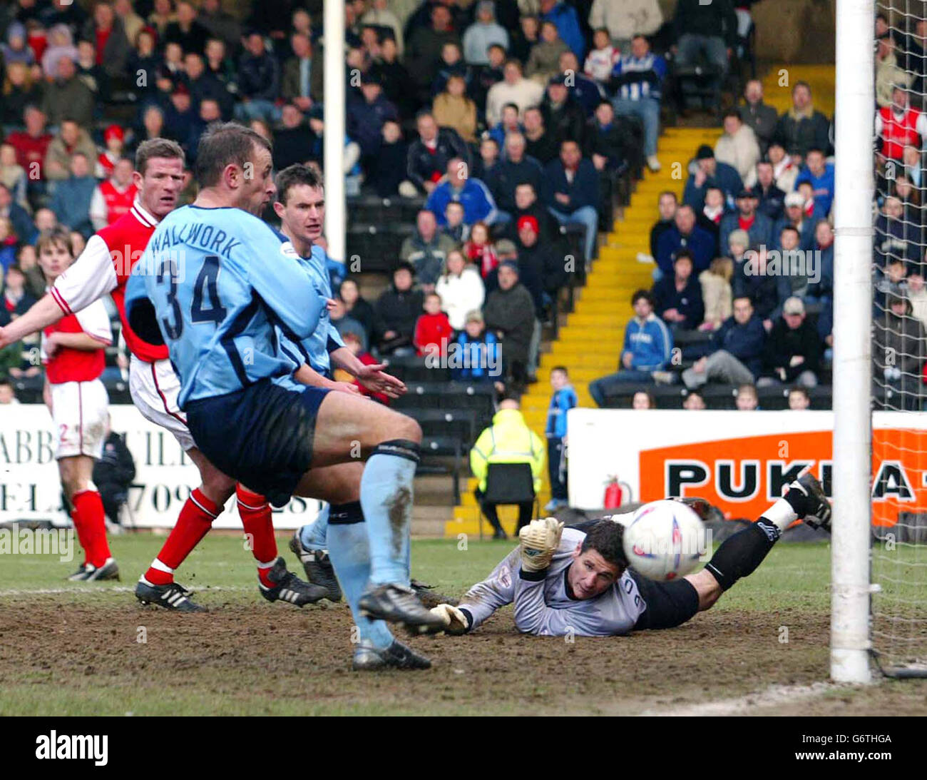 A freekick by Bradford's Paul Evans beats Rotherham's goalkeeper Mike ...