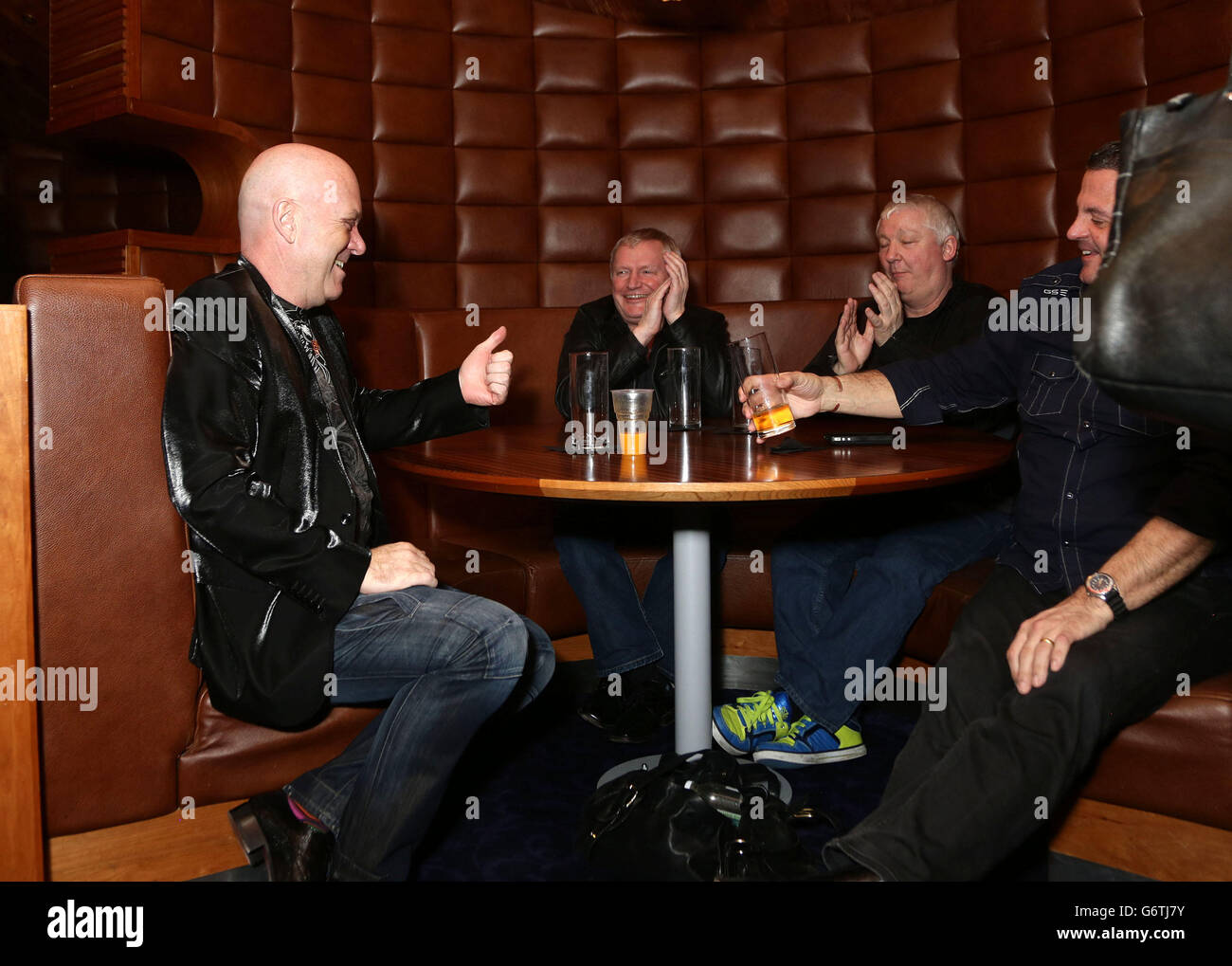 The winning bidder of a prize during the charity auction hi-res stock ...