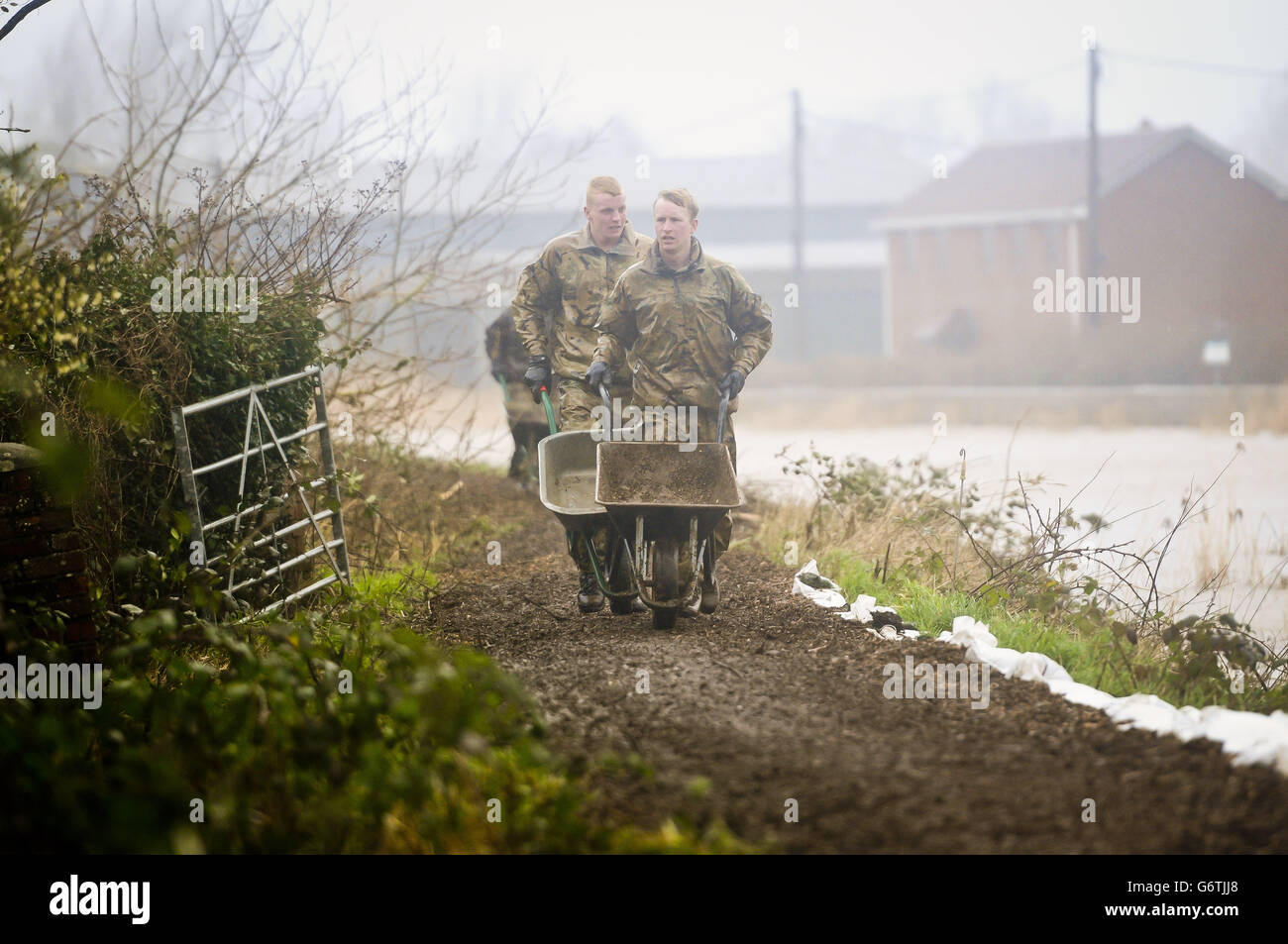The British Army help to create a safe access route by the River ...