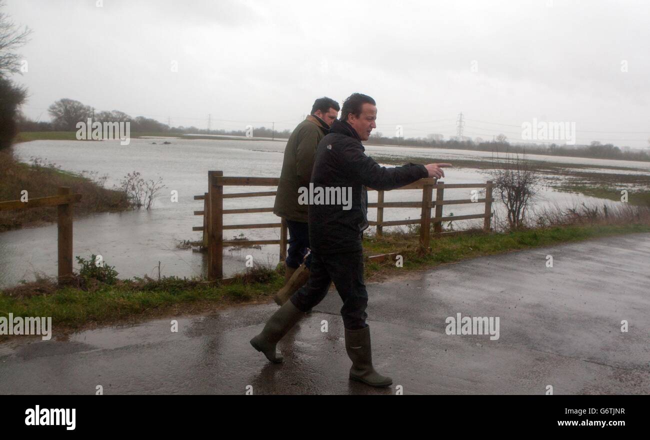 Prime Minister and MP for Witney David Cameron talks with farmer Tim ...