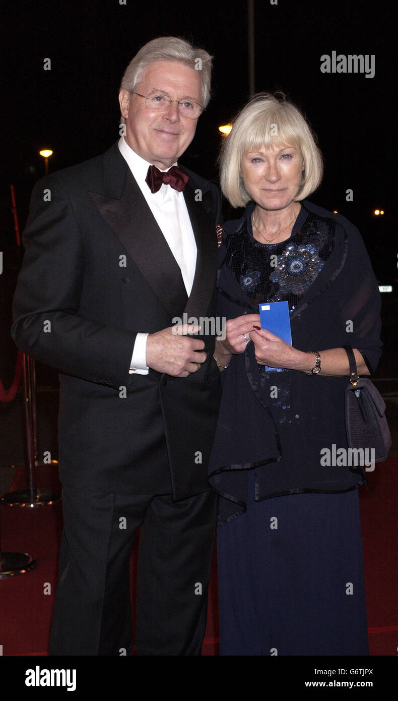 Michael Aspel and his partner Irene arrive for the Bob Monkhouse BAFTA ...