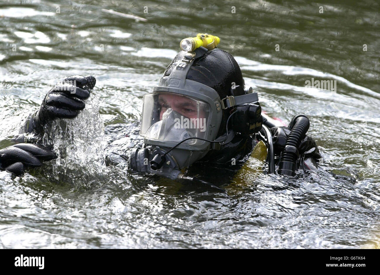 A police diver prepares to search Slade reservoirs near Ilfracombe ...
