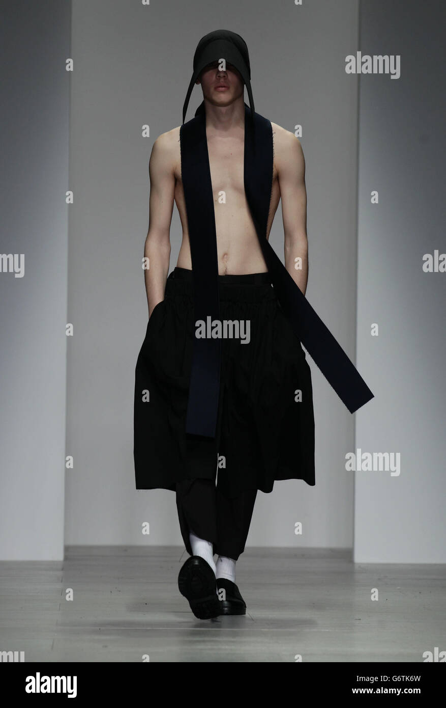 Models on the catwalk during the Rory Mooney autumn/winter 2014 ...
