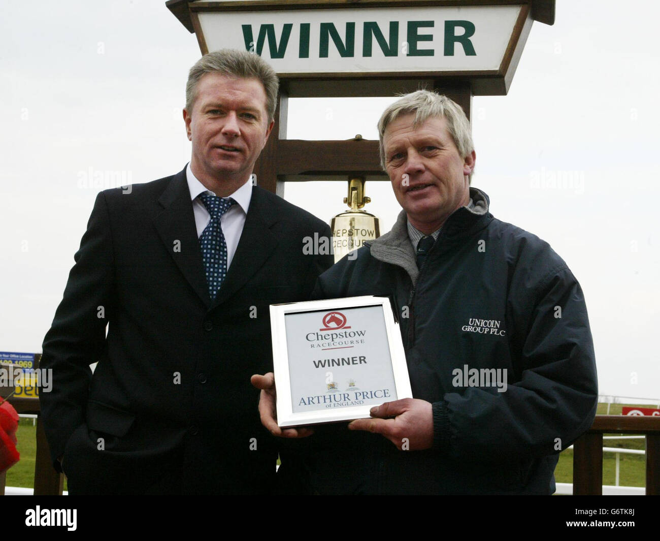 Gerald Burton (right) head trainer for Jim Old receives the winning ...