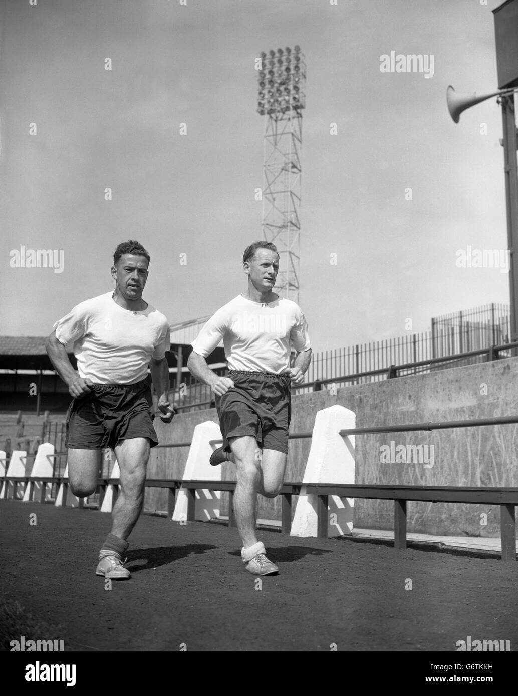 Preston footballers Tom Finney (right) and Willie Cunningham train at ...