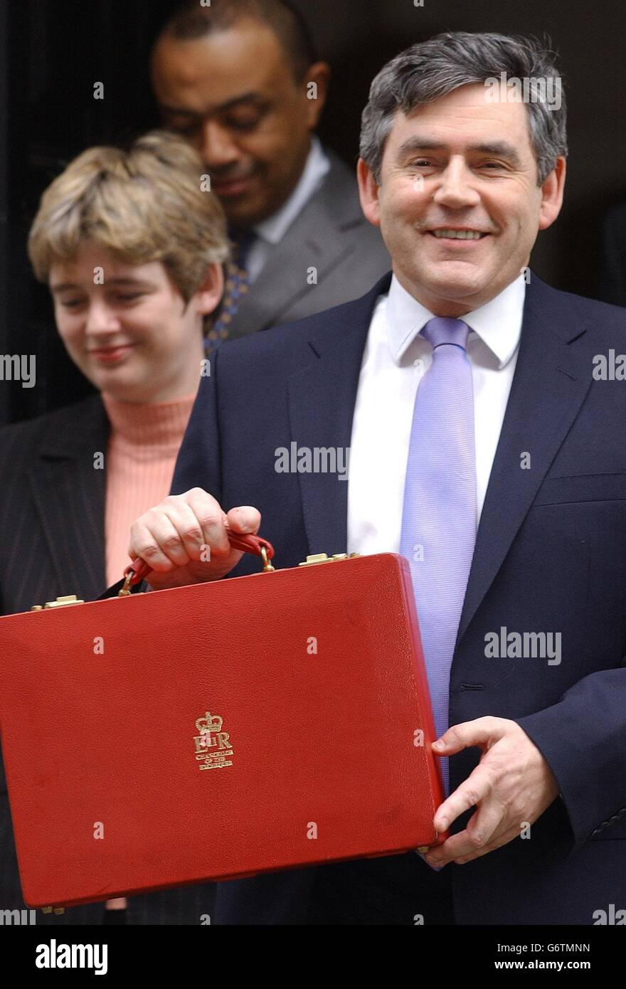 Holds aloft the budget box with his team hi-res stock photography and ...