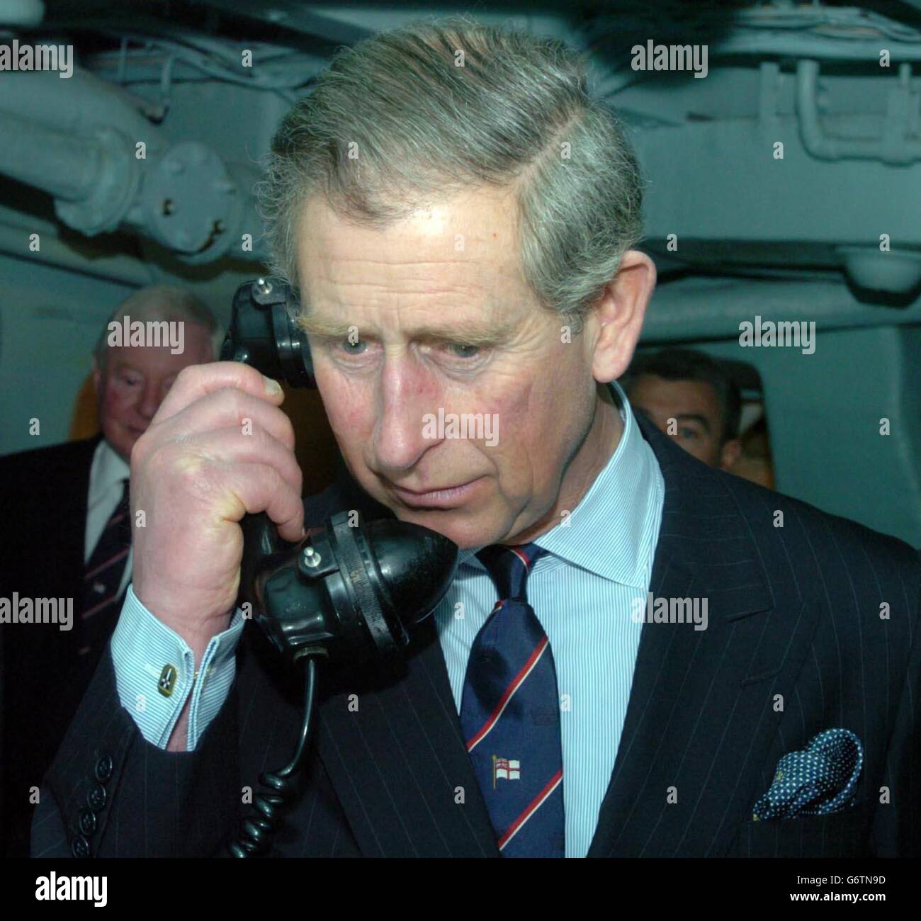 The Prince of Wales aboard HMS Belfast, using the ships telephone ...
