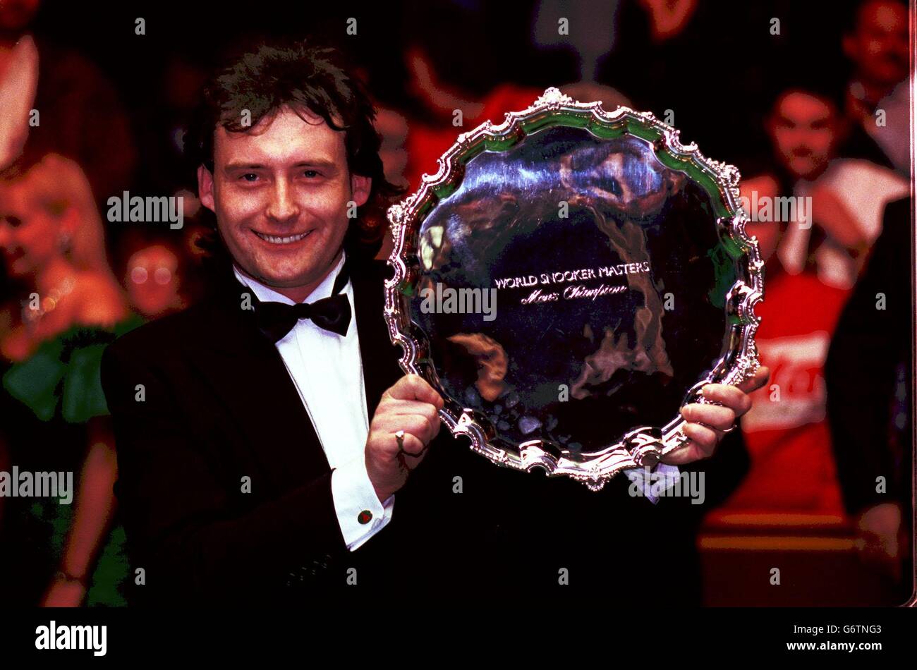 Jimmy white holds aloft the winners trophy cheque worth 200 hi-res ...