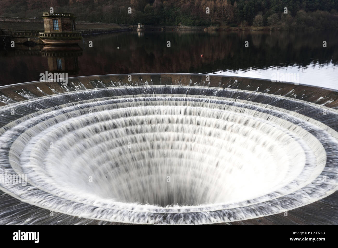 Water flows down the "plughole" on the Ladybower Reservoir, one of two ...