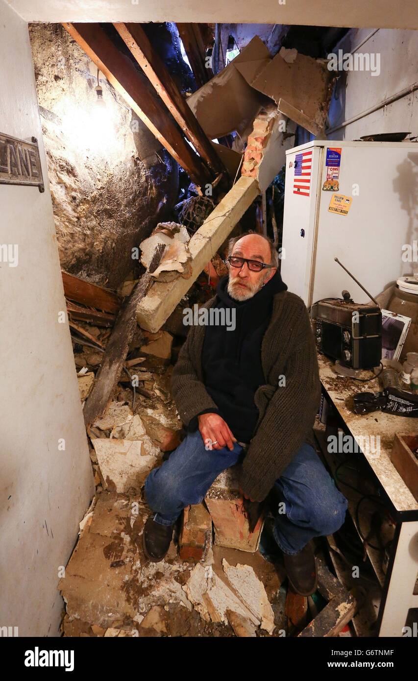 Chris Paraskeva, whose house was badly damaged when a section of the ...